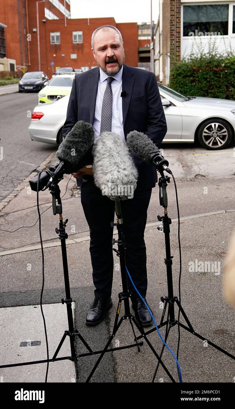 Detective Superintendent Rob Kirby updates the media gathered outside ...