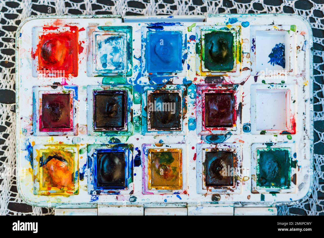 used and stained watercolor set, on a table outdoors Stock Photo - Alamy