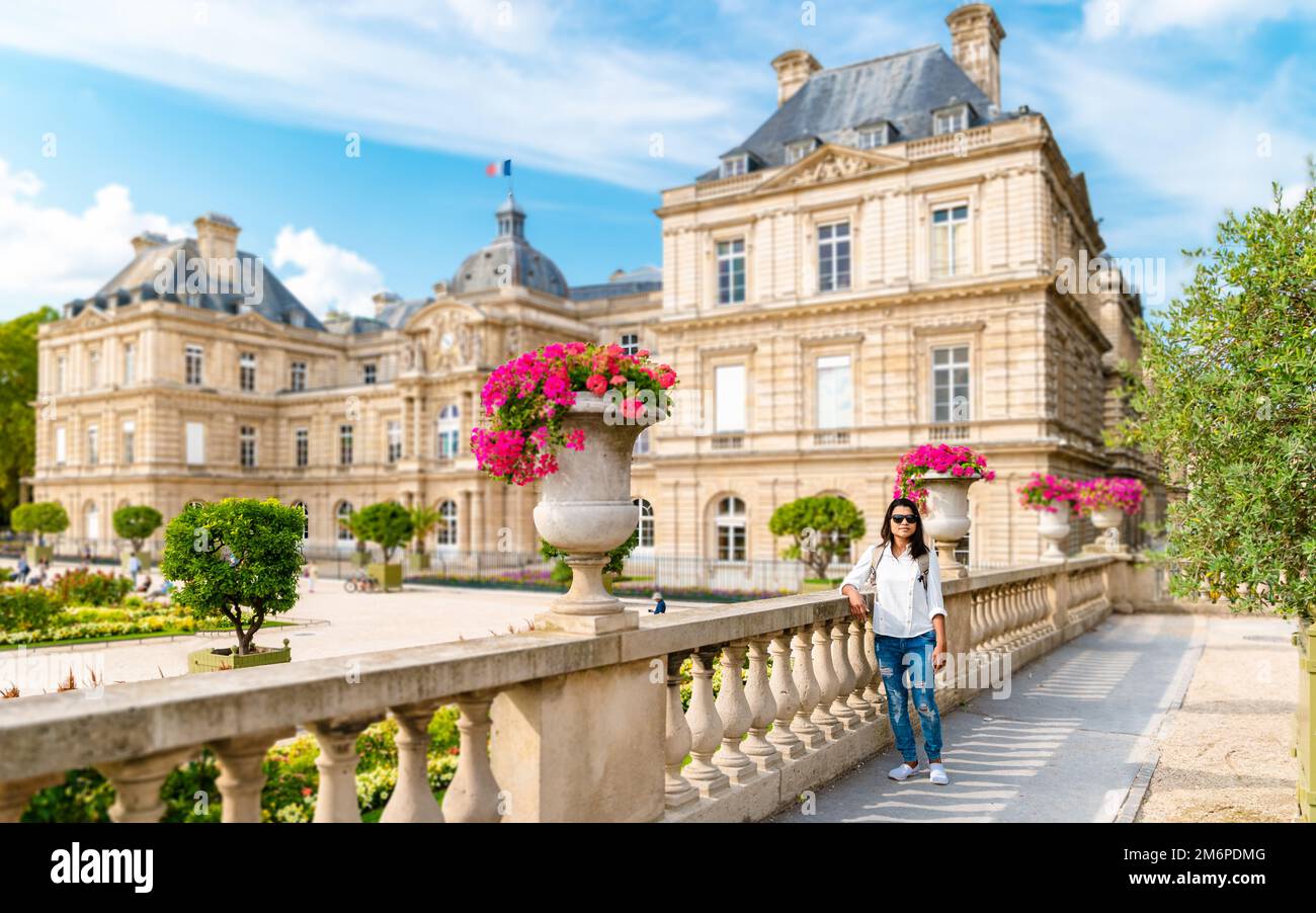 Asian women visiting Le Jardin Luxembourg park in Paris during summer ...