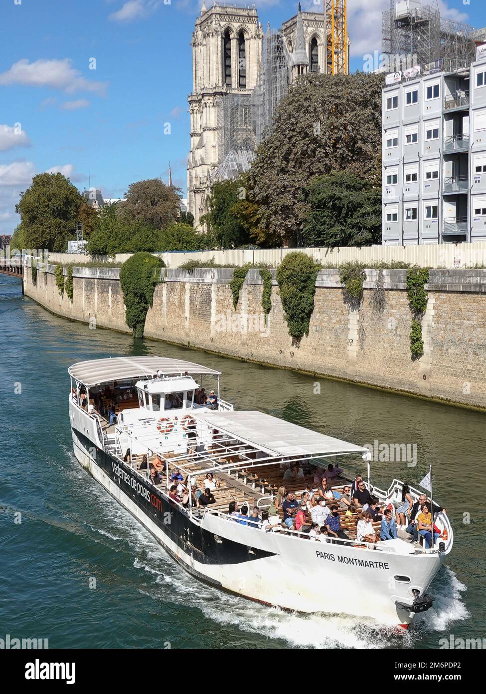 France, Paris, Tourist boats cruising the Seine river. Photo © Fabio ...