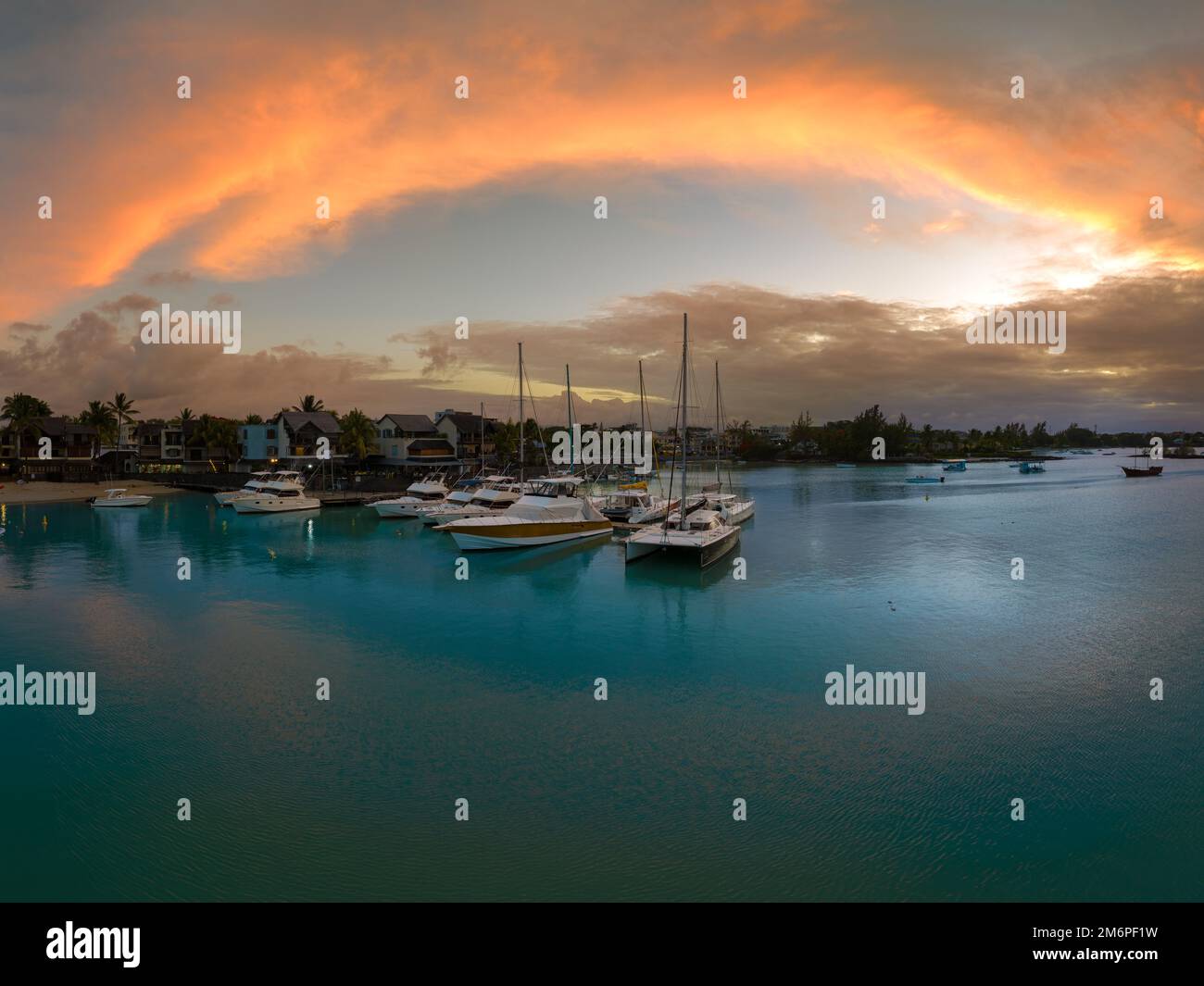 Sunset at grand baie in Mauritius. Luxury beaches any yacht port ...
