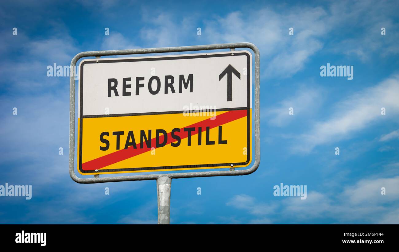 Street Sign to Reform versus Standstill Stock Photo - Alamy