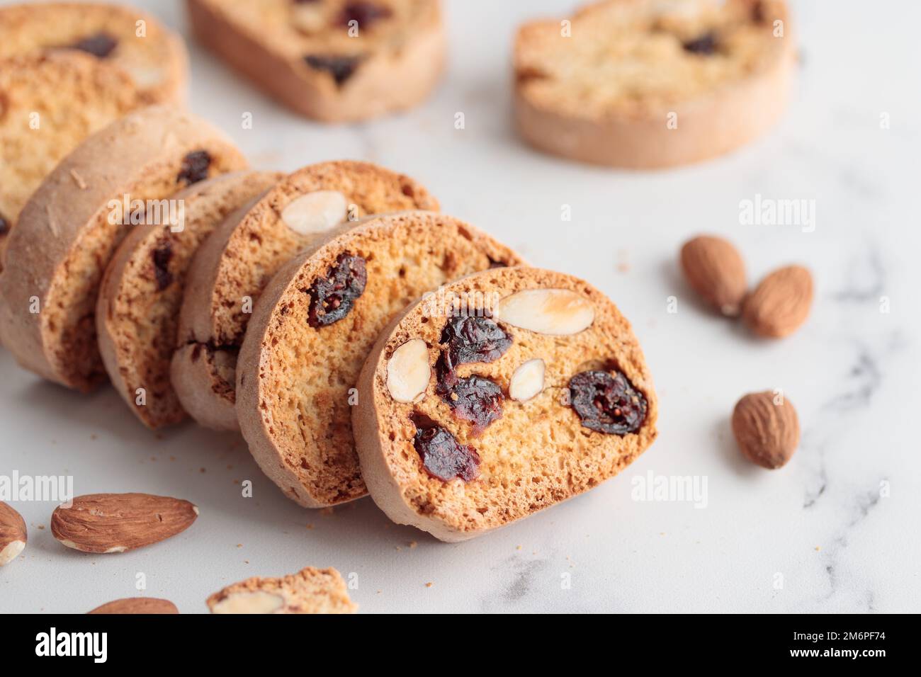 Biscotti cantucci cookies with almond and cranberry on white background ...