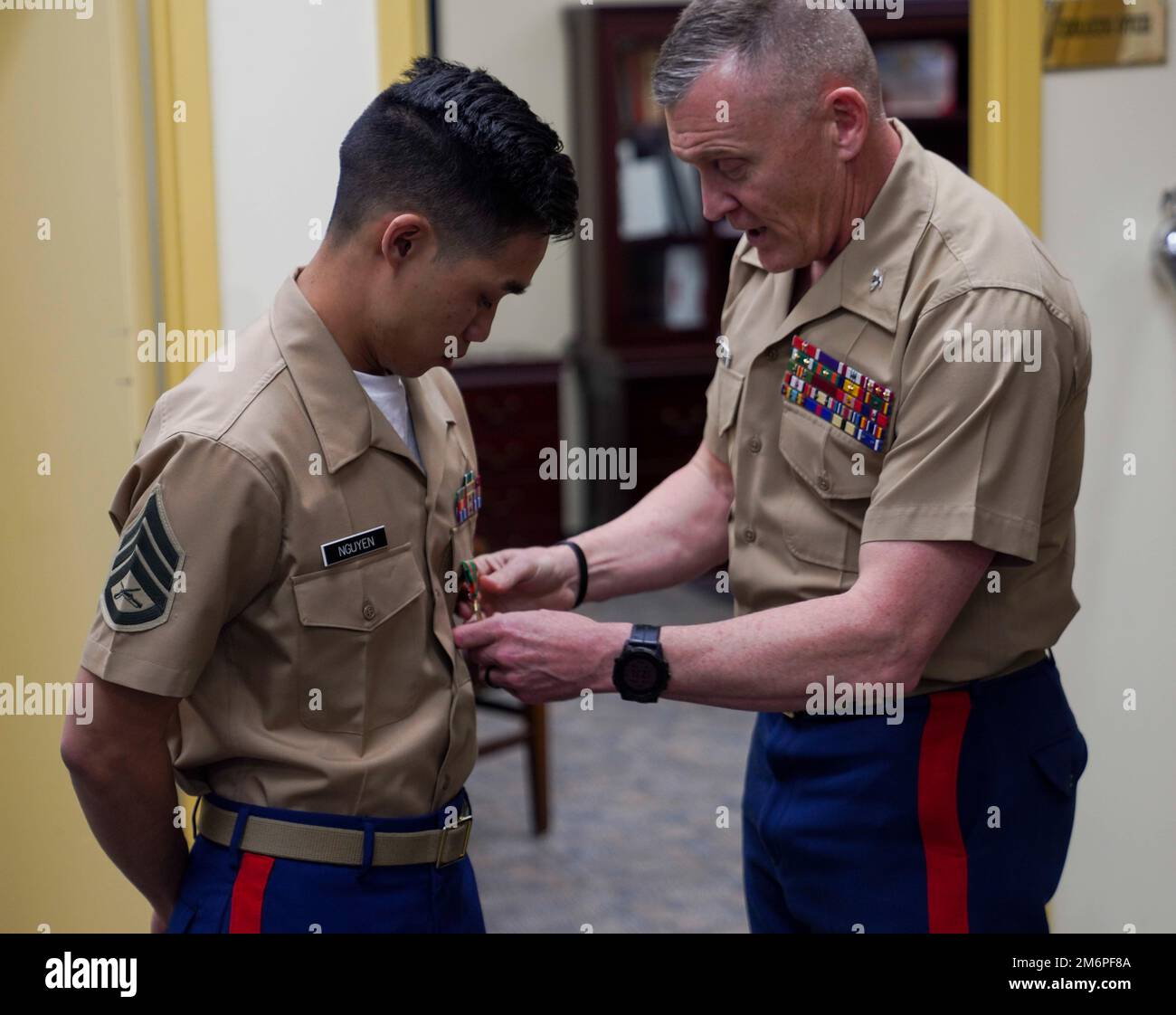U.S. Marine Corps Col. Phillip N. Ash (right), commanding officer, 1st ...