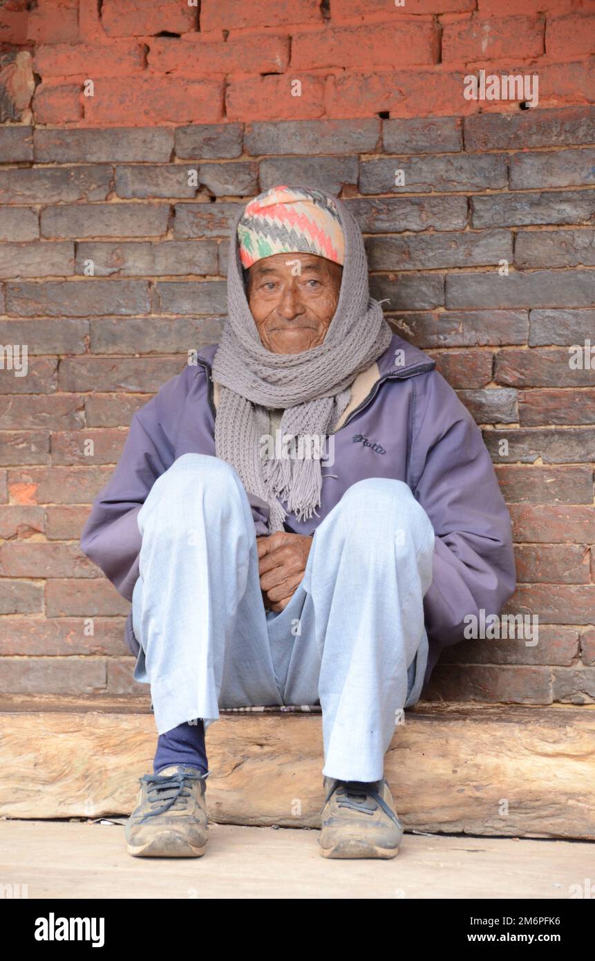 Faces of Nepal - Mature Men wearing Nepali topi Stock Photo - Alamy