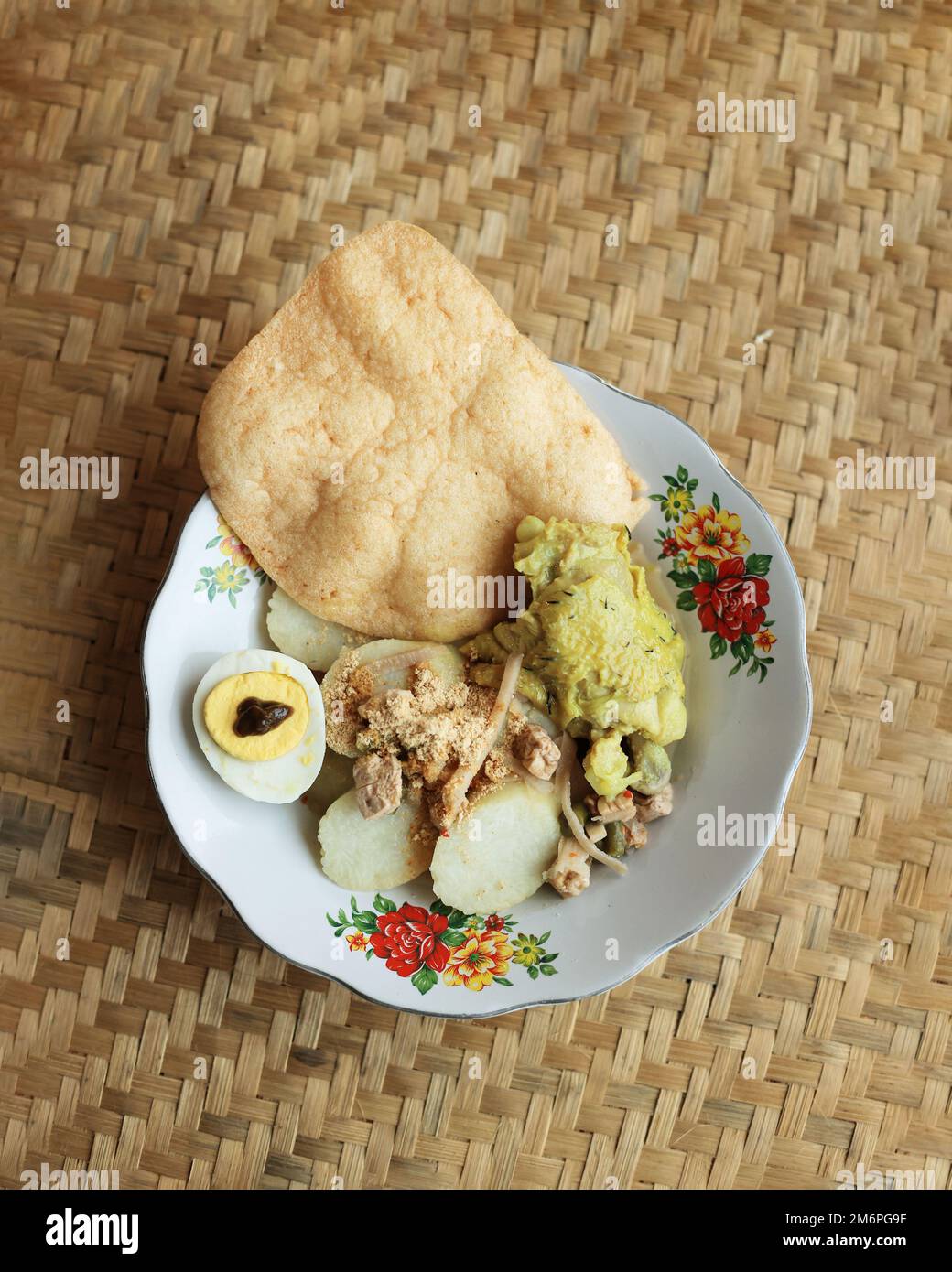 Top View Lontong Petis Cap Go Meh with Shrimp Cracker Stock Photo - Alamy