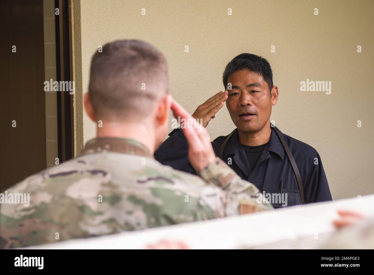 Shitetsu Hirata, right, 18th Security Forces Squadron civilian guard ...