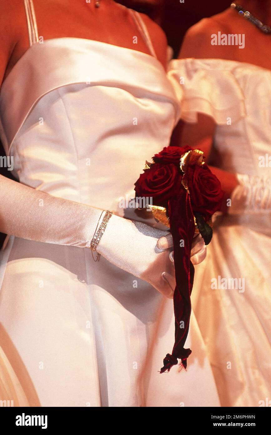 Austria. Vienna. The balls season. White dress and roses for the girls ...