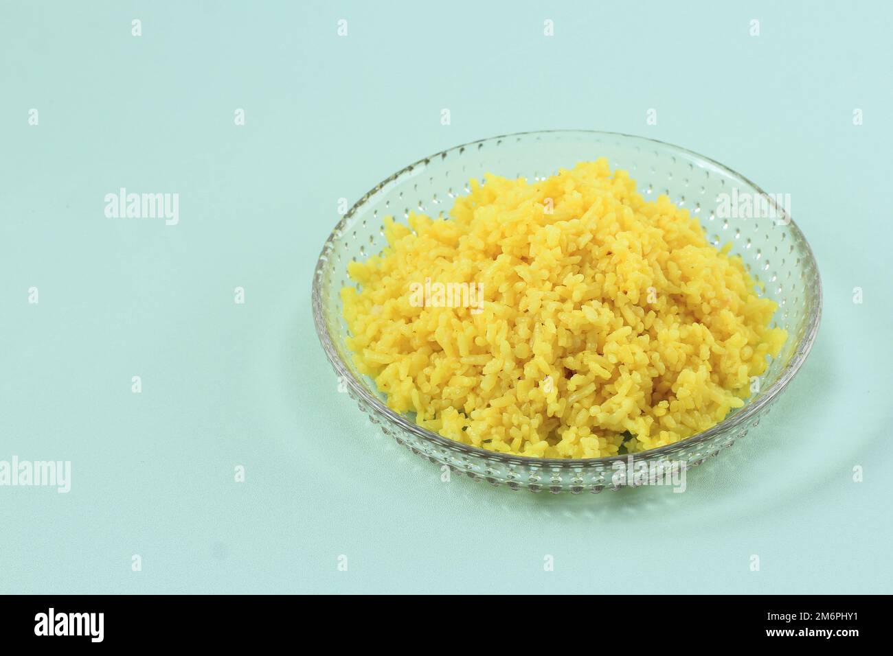 Nasi Kuning or Yellow Rice on a Plate, Typical Indonesian Food. made ...