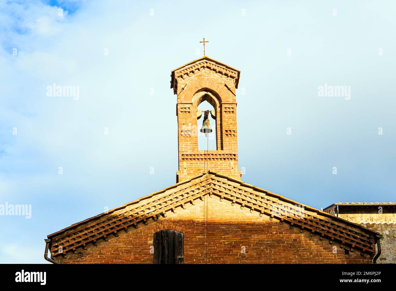 Bell tower with a bell topped Stock Photo - Alamy