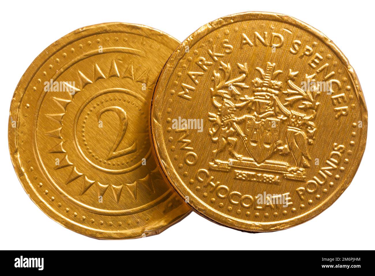 M&S Golden Coins made from solid milk chocolate isolated on white ...