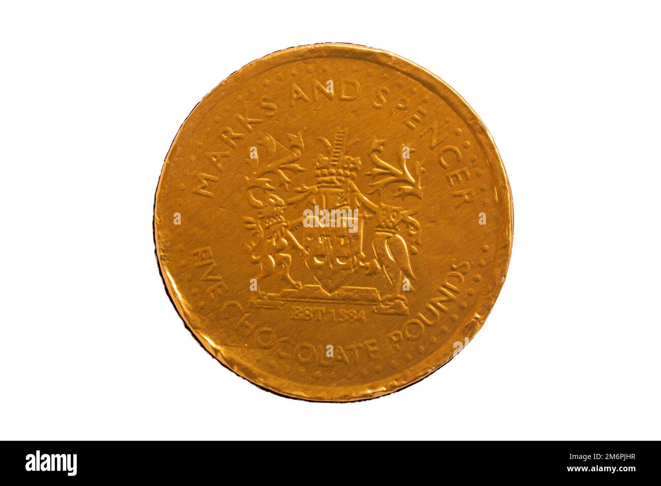 M&S Golden Coins made from solid milk chocolate isolated on white ...