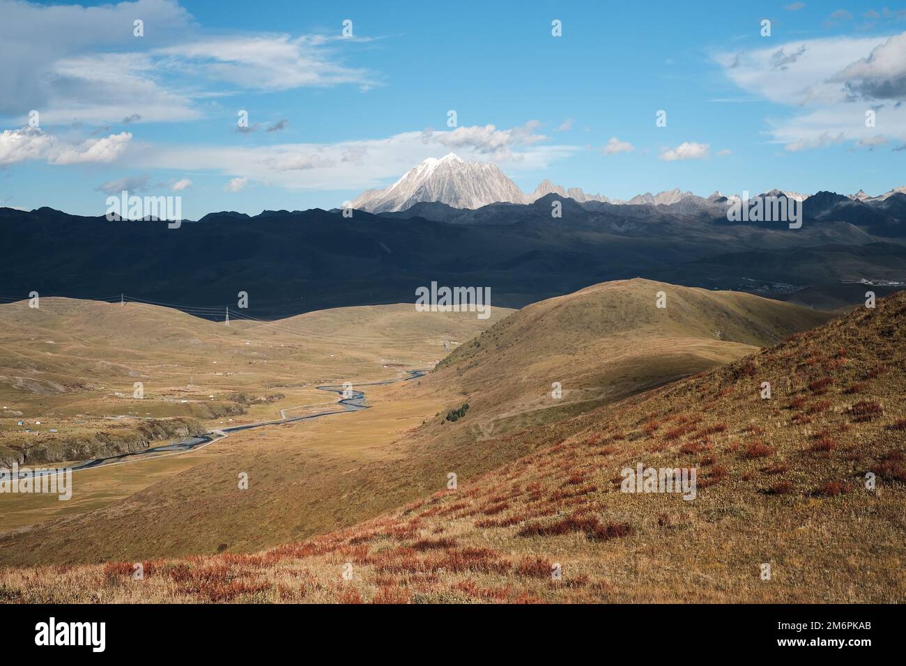The panoramic view of grassland and mountain. Blue sky with clouds ...