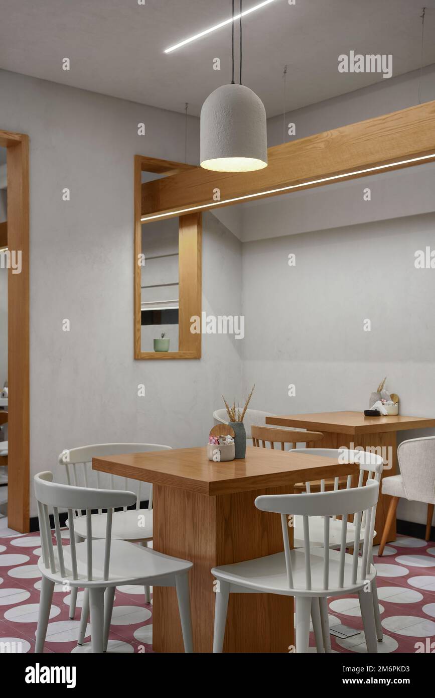 Cafe tables night Stock Photo - Alamy