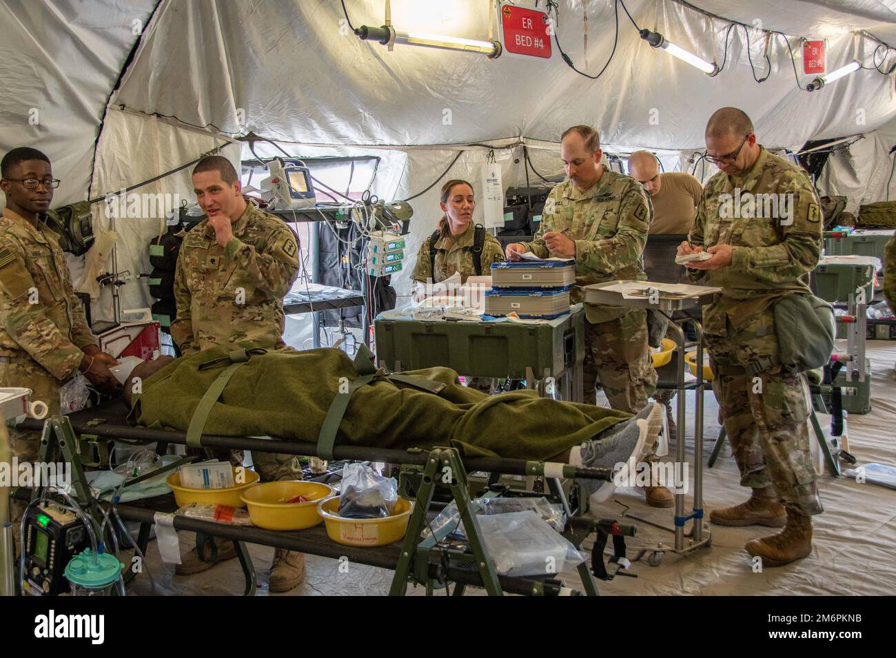 U.S. Army soldiers assigned to the 512th Field Hospital waiting in the ...