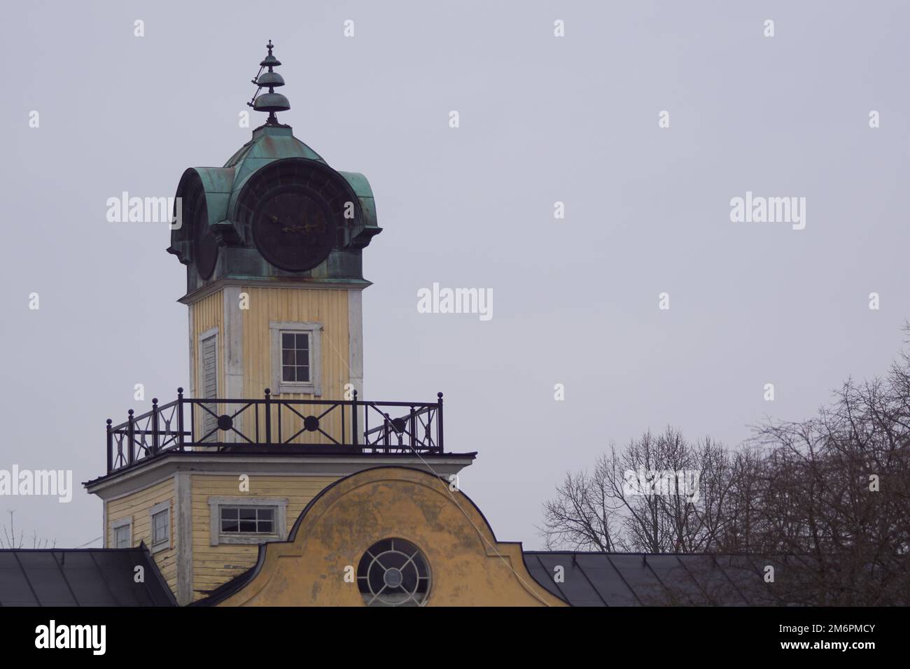Low angle view of clock tower against sky Stock Photo - Alamy