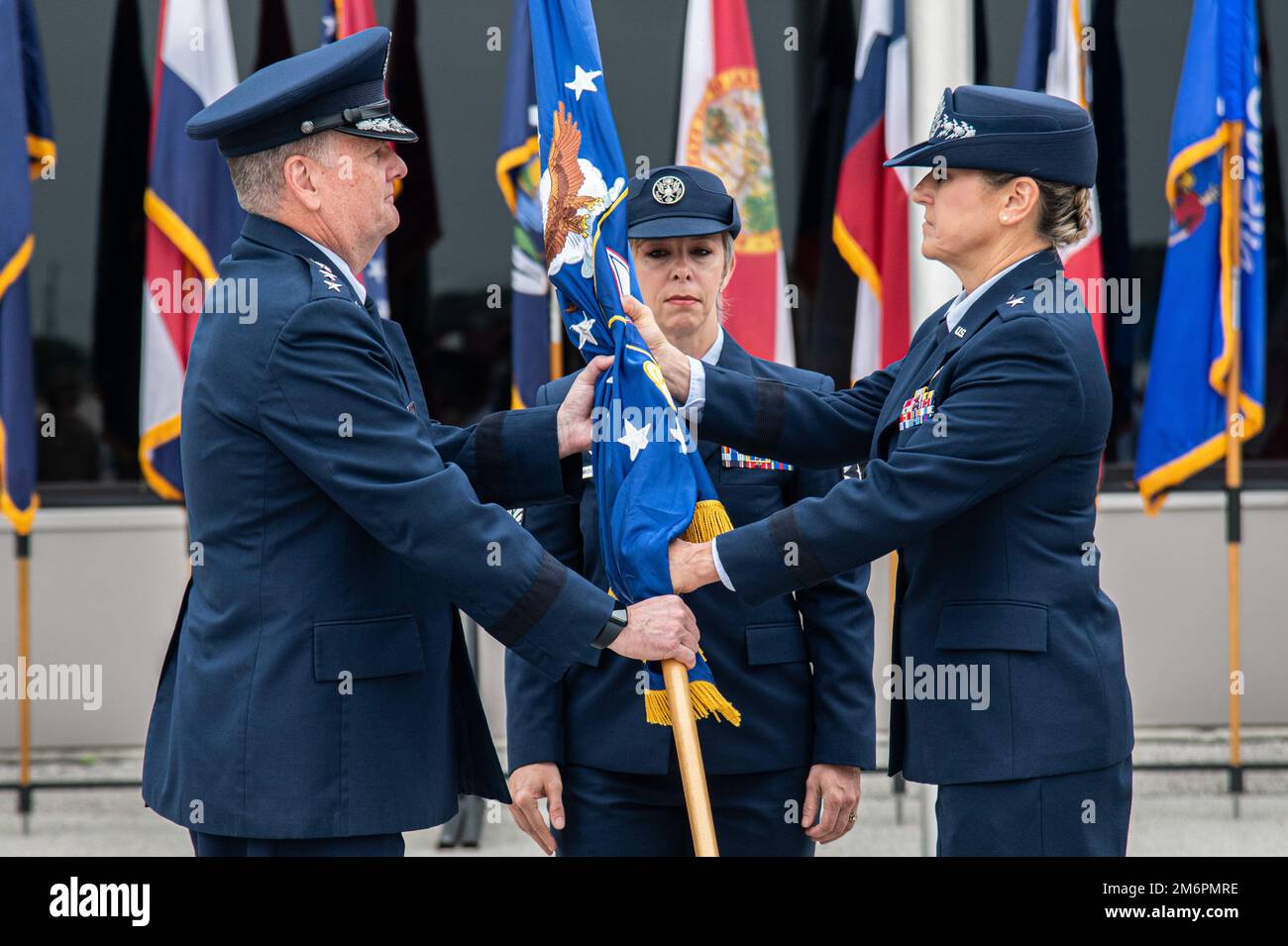 U.S Air Force Brig. Gen. Caroline Miller passes the guidon to Lt. Gen ...