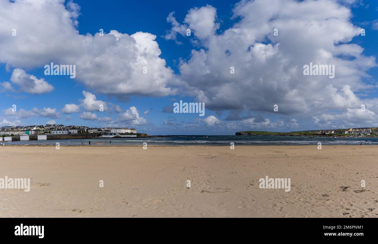 Panorama view of Kilkee Bay and village with the golden sand beach ...