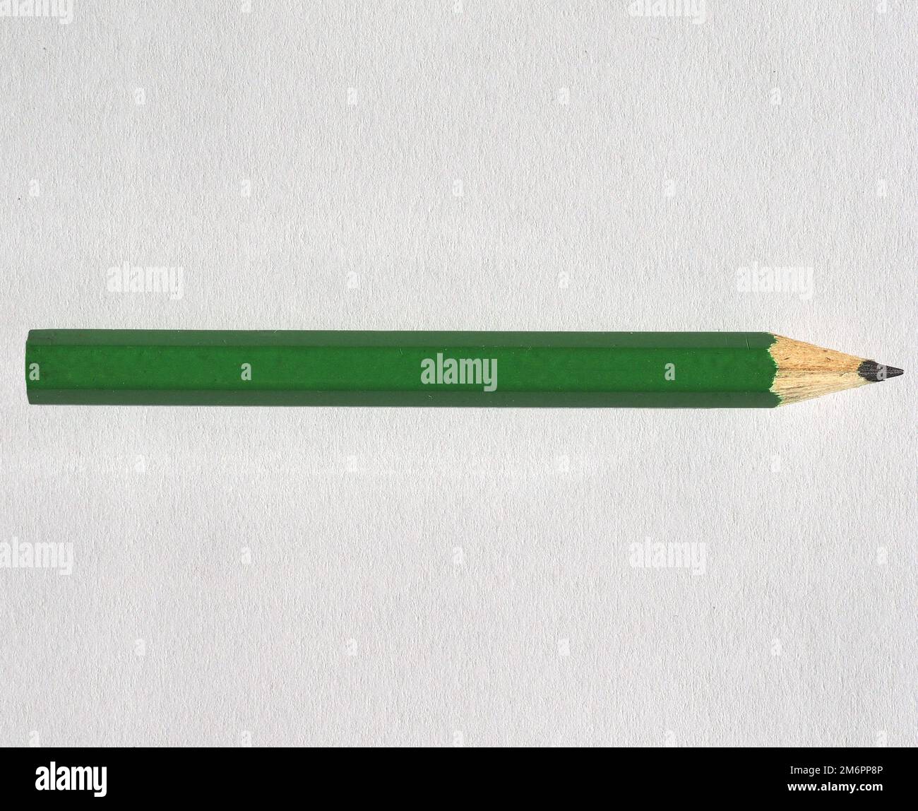 green pencil on blank paper sheet with copy space Stock Photo - Alamy