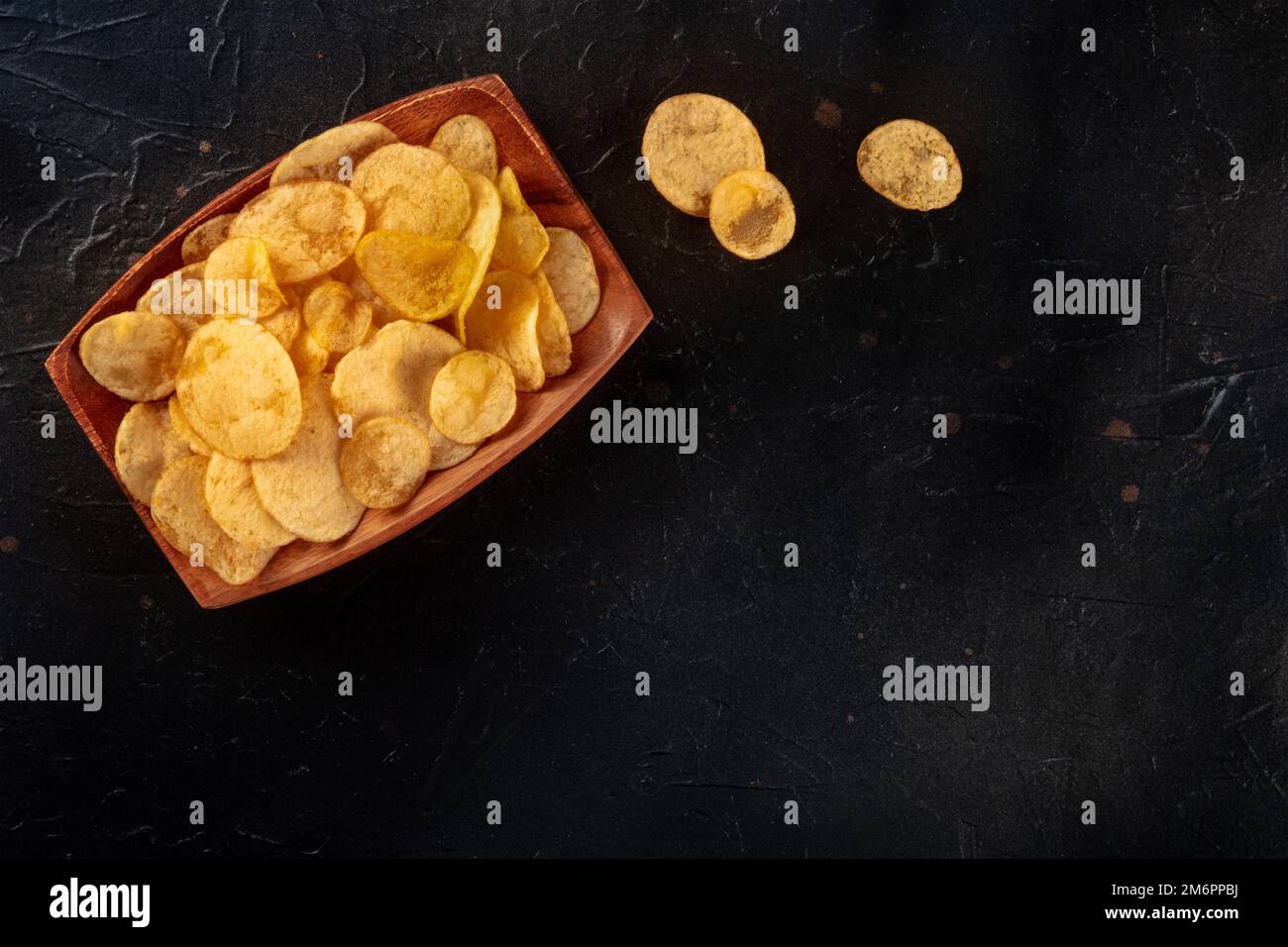 Potato chips or crisps in a bowl, overhead flat lay shot Stock Photo ...