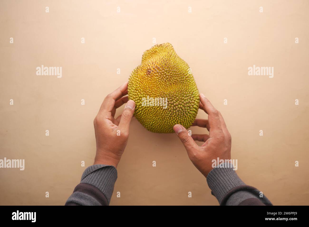 Jackfruit holding hi-res stock photography and images - Alamy
