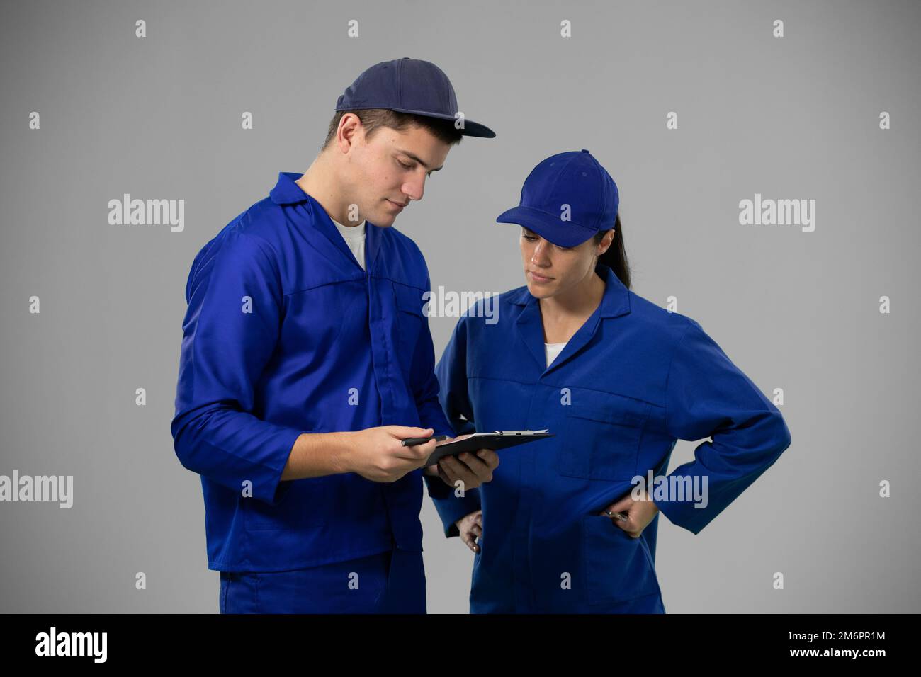 Male engineers discussing standing hi-res stock photography and images - Alamy