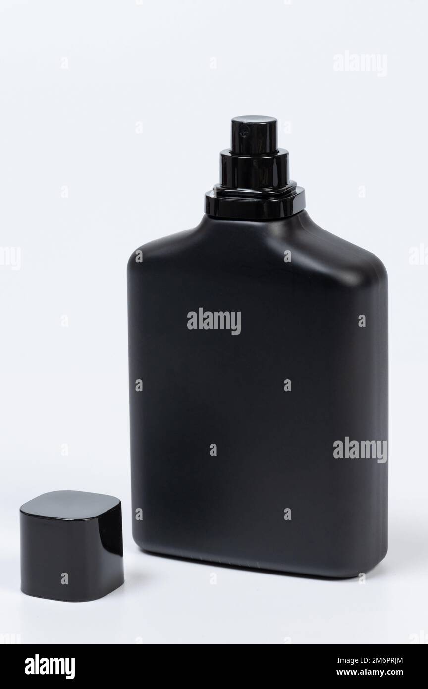 Open perfume bottle isolated on white studio background Stock Photo - Alamy