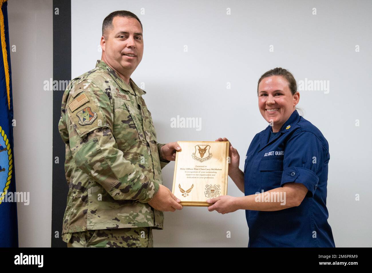 Petty Officer 1st Class Lacy McMahon receives recognition from Air ...