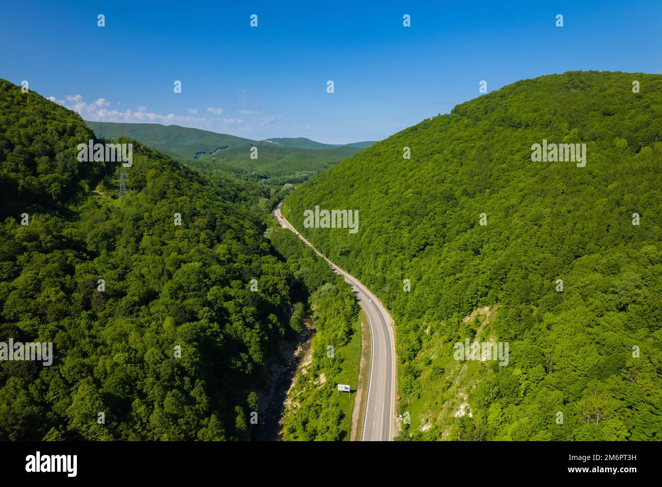Aerial view of winding road from the high mountain pass. Great road ...