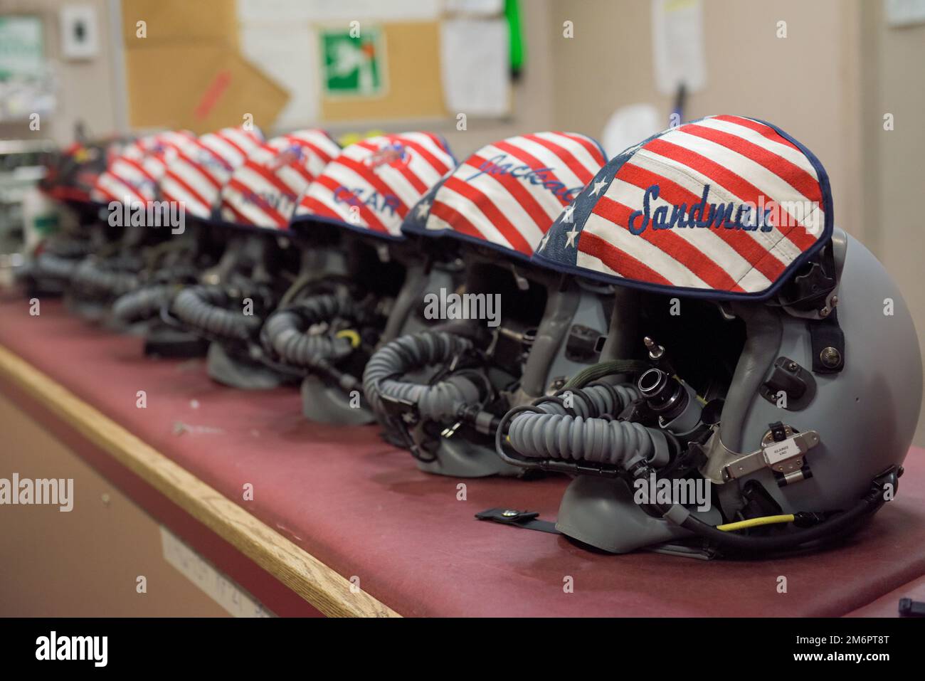 Helmets from the 36th Fighter Squadron sit on a counter in advance of ...