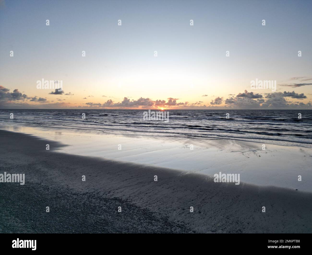 A beautiful landscape of the sea on the sunset Stock Photo - Alamy