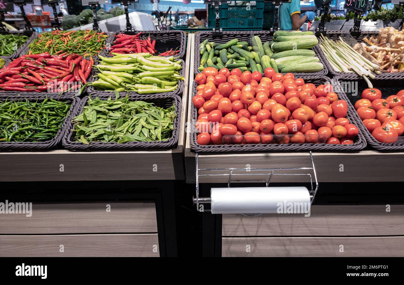 Vegetables sell in grocery store. Assorted vegetables in market with a ...