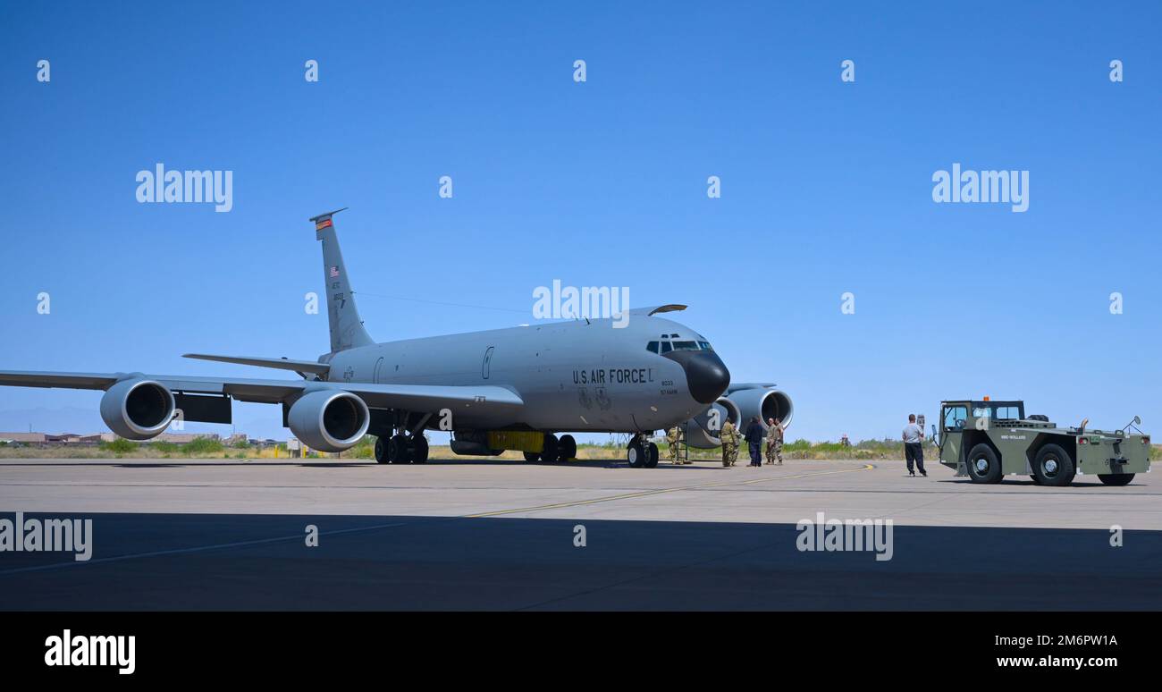 KC-135 Stratotanker aircrew and maintainers unload cargo off the aircfaft as it arrives from ...