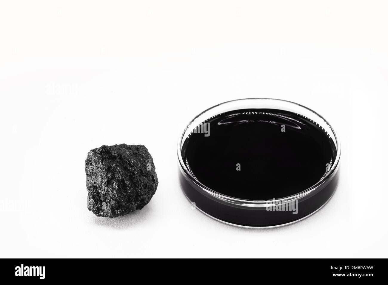 petri dish with petroleum, fuel oil, isolated white background, with ...