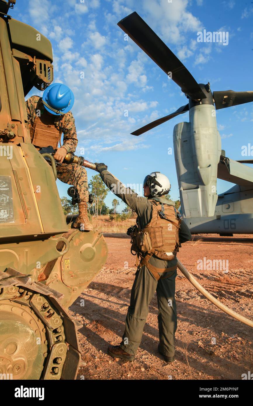 U.S. Marine Corps Lance Cpl. Moises Martinez (left), a heavy equipment ...