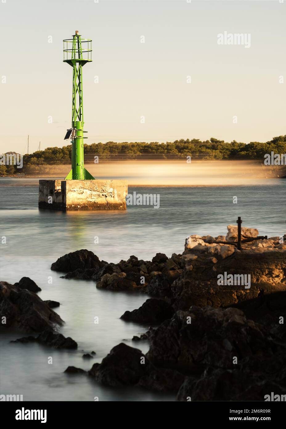 Small beacon at the pier in Croatia Stock Photo - Alamy