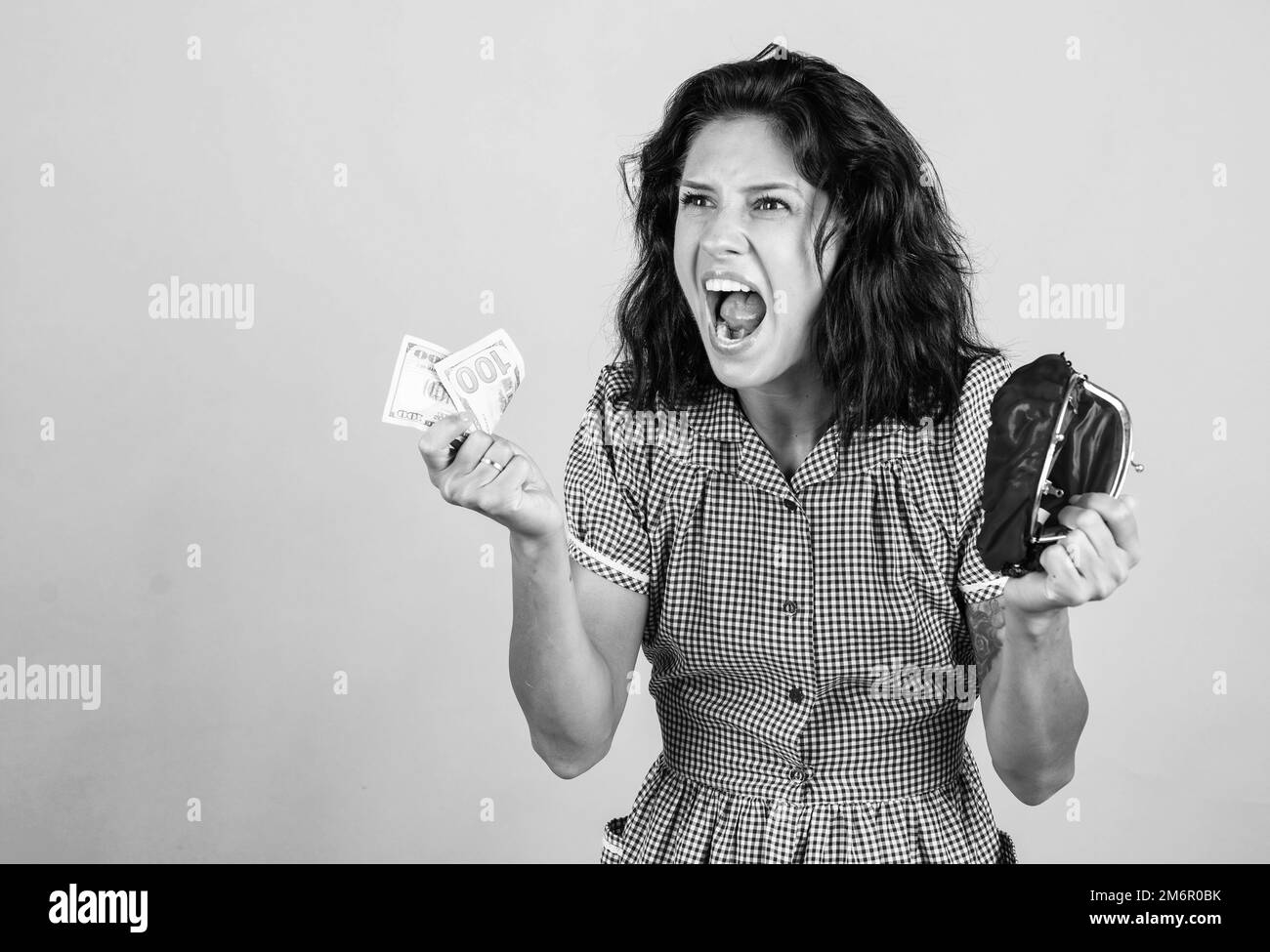 Shopaholic. economy and crisis concept. Female housewife has financial ...