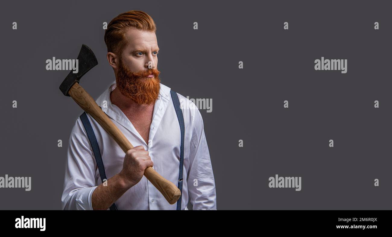masculinity of man with axe on background, advertisement Stock Photo ...