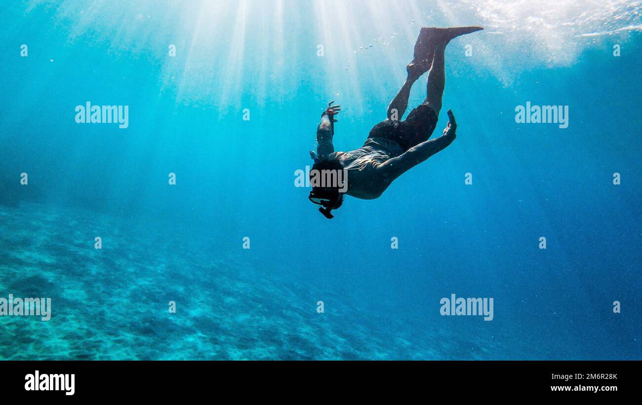 A male diver under the deep ocean Stock Photo - Alamy
