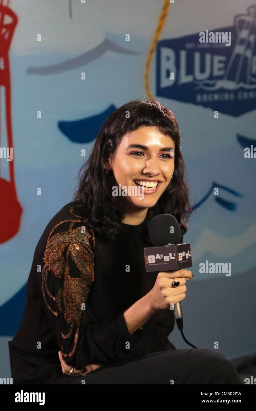 Charlotte OC shooting an interview in Brooklyn Stock Photo - Alamy