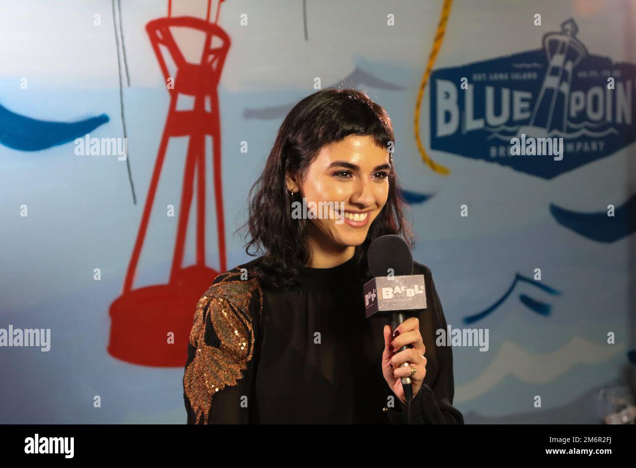 Charlotte OC shooting an interview in Brooklyn Stock Photo - Alamy