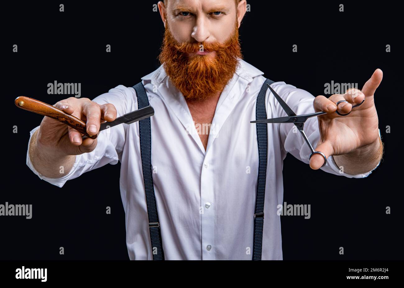 caucasian barbershop man with scissors and retro razor blade. photo of ...