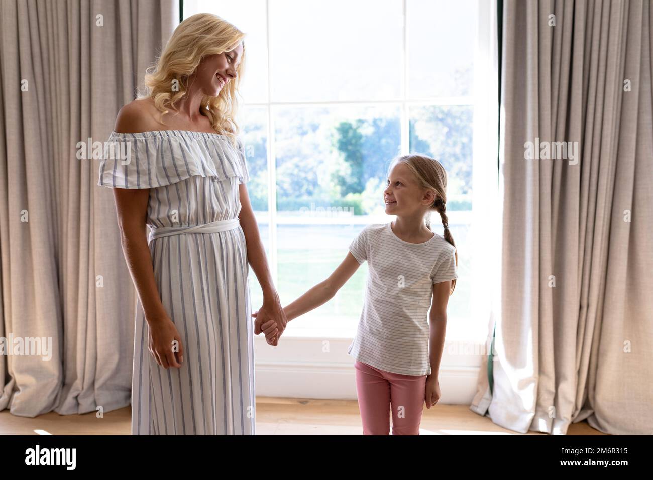 Caucasian woman enjoying her time at home Stock Photo - Alamy