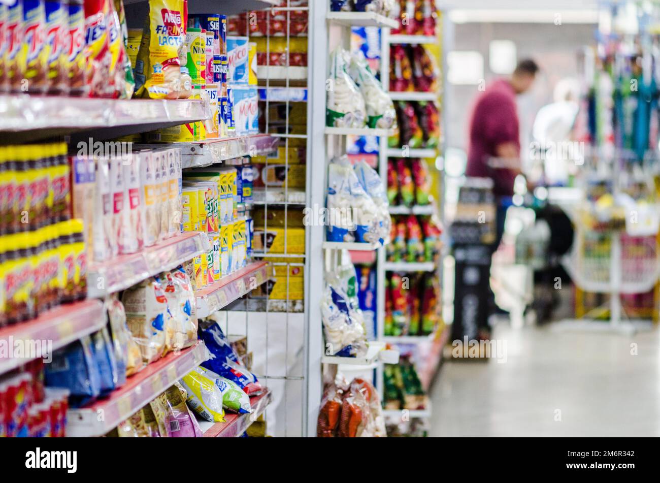 Aisles with products inside a modern supermarket in Brazil, selective ...