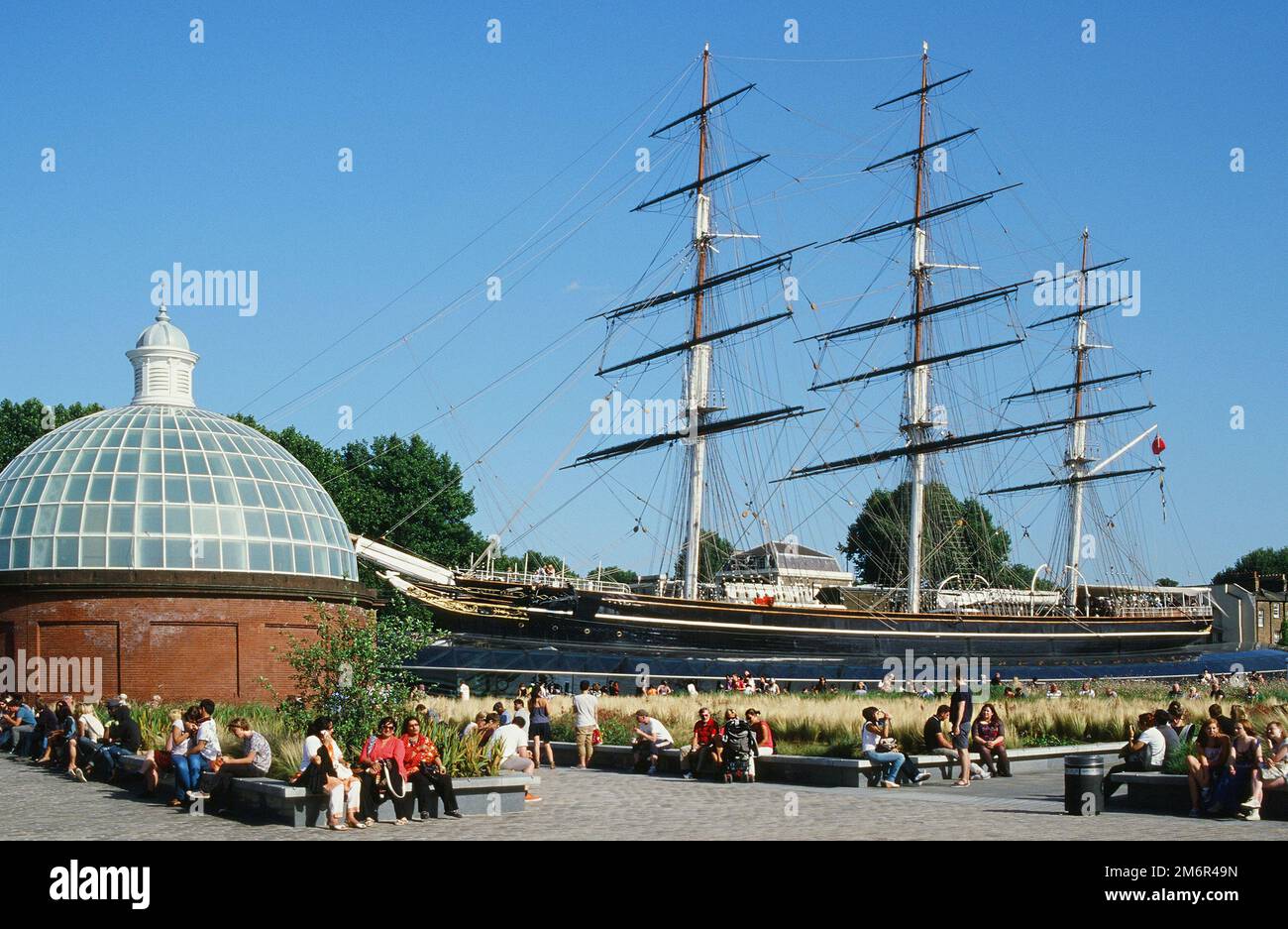 Crowds outside the Cutty Sark at Greenwich, South East London, UK, with ...