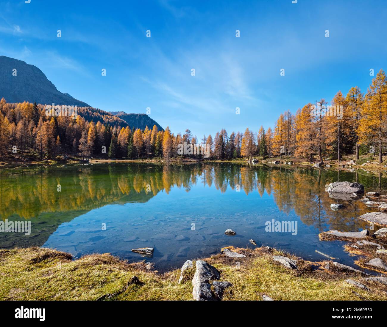 Autumn alpine mountain lake near San Pellegrino Pass, Trentino ...