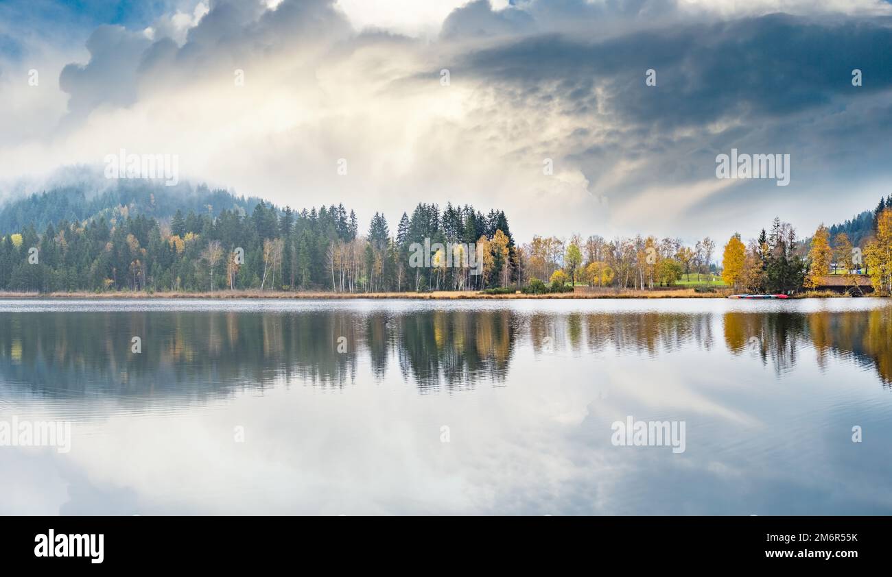 Mountain alpine autumn lake Schwarzsee, Kitzbuhel, Tirol, Austria Alps ...