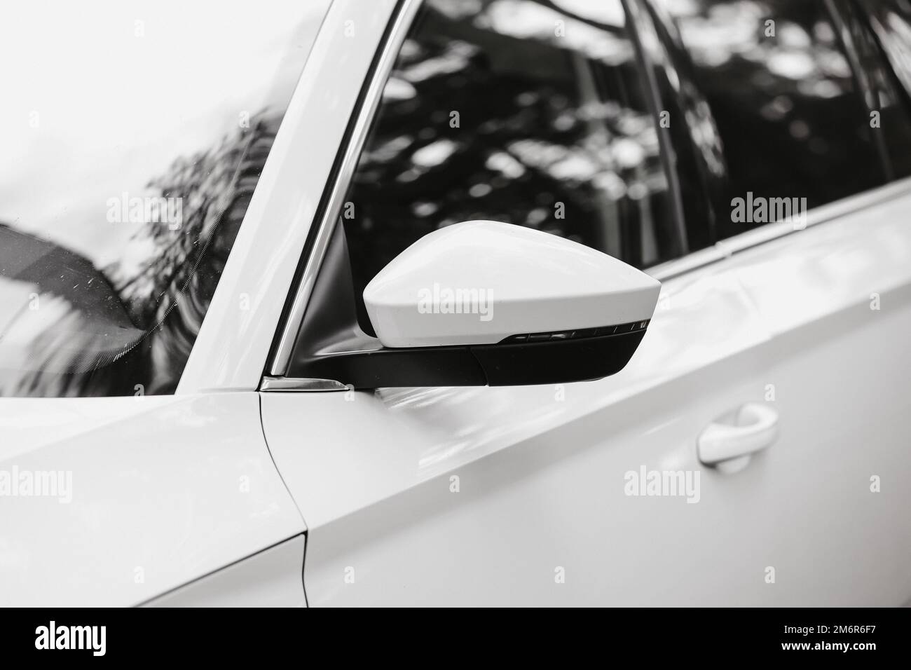 Left rear view mirror, back view. Rear-view mirror on a white modern ...