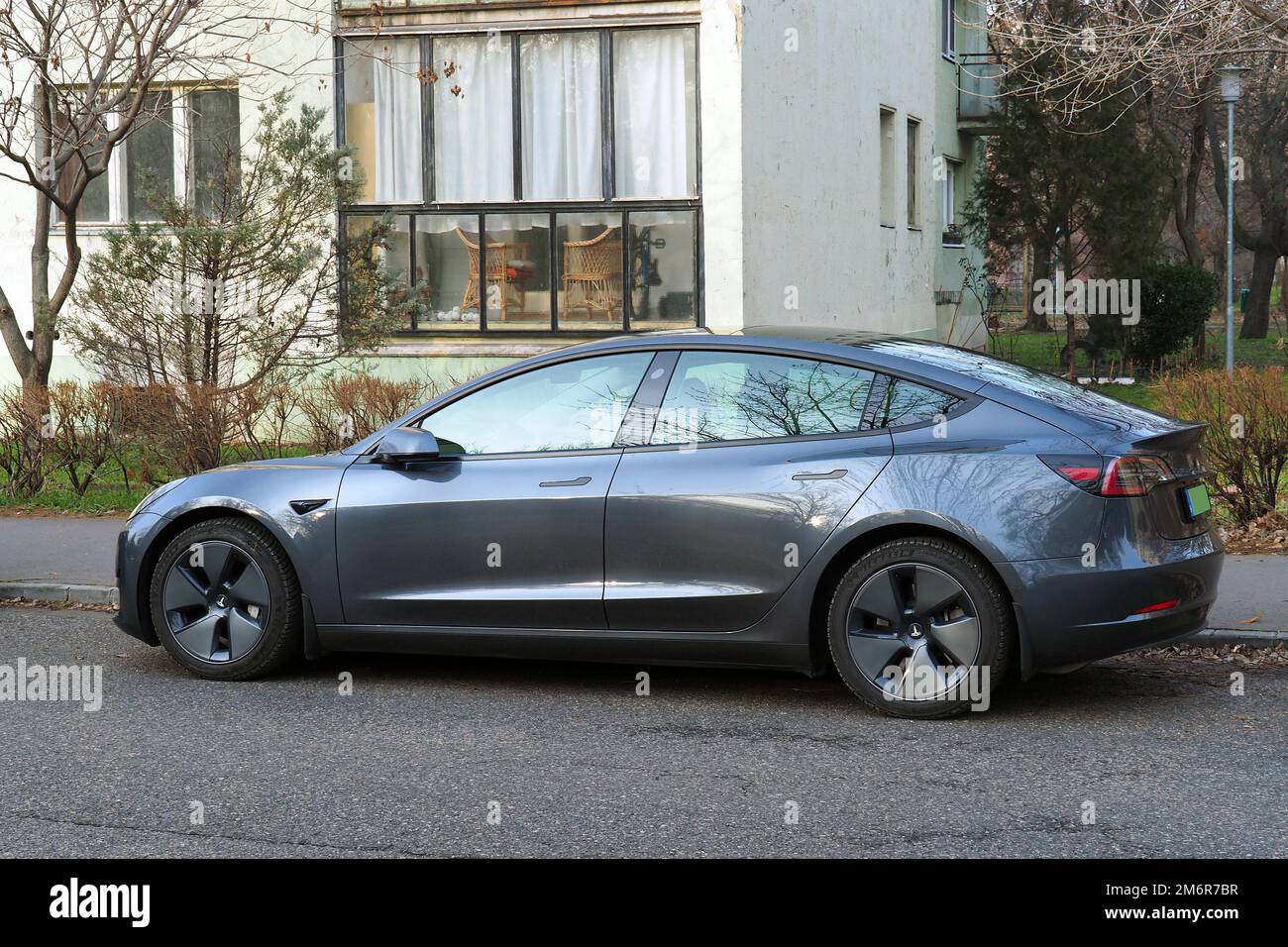 Tesla Model 3 electric vehicles, (is an American multinational ...