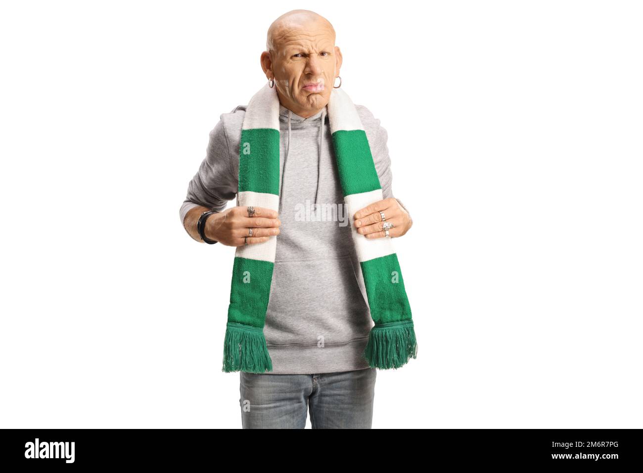 Grumpy bald man with a green and white scarf isolated on white ...